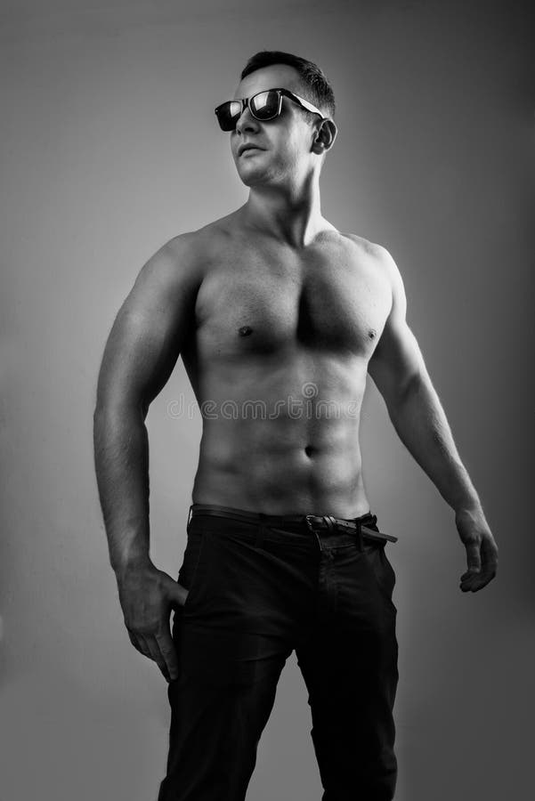 Portrait of Muscle Man Model Posing in Studio Stock Photo - Image of ...