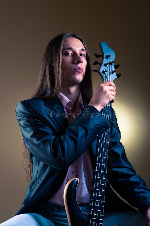 Portrait of Musician with Bass Guitar Stock Image - Image of instrument ...