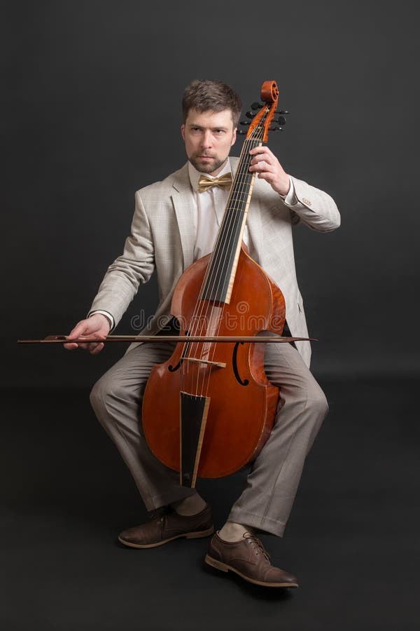 Man Playing the Viola Da Gamba Stock Photo - Image of males, face: 73570648