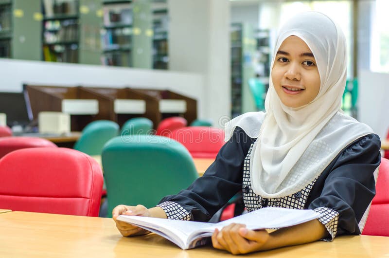 Portrait of Muslim in the Library Stock Photo - Image of girl, muslimah ...
