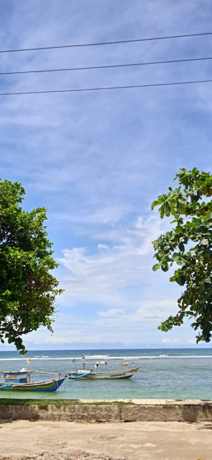 A Portrait Nature View for a Beach with Boats Editorial Stock Photo ...