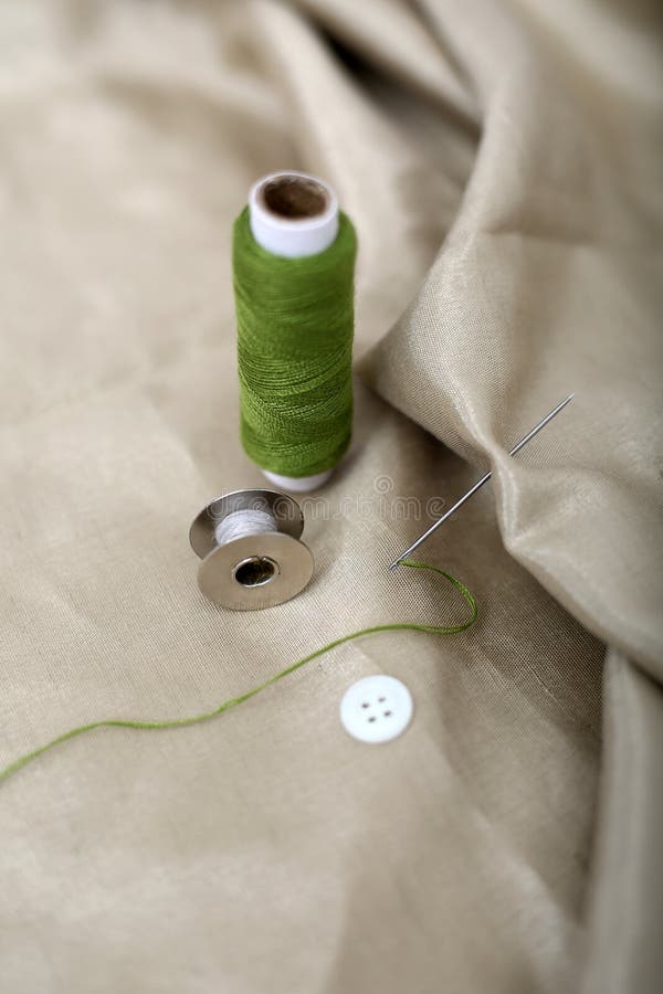 Portrait of Needle Attached in Cloth with Green Sewing Thread and ...