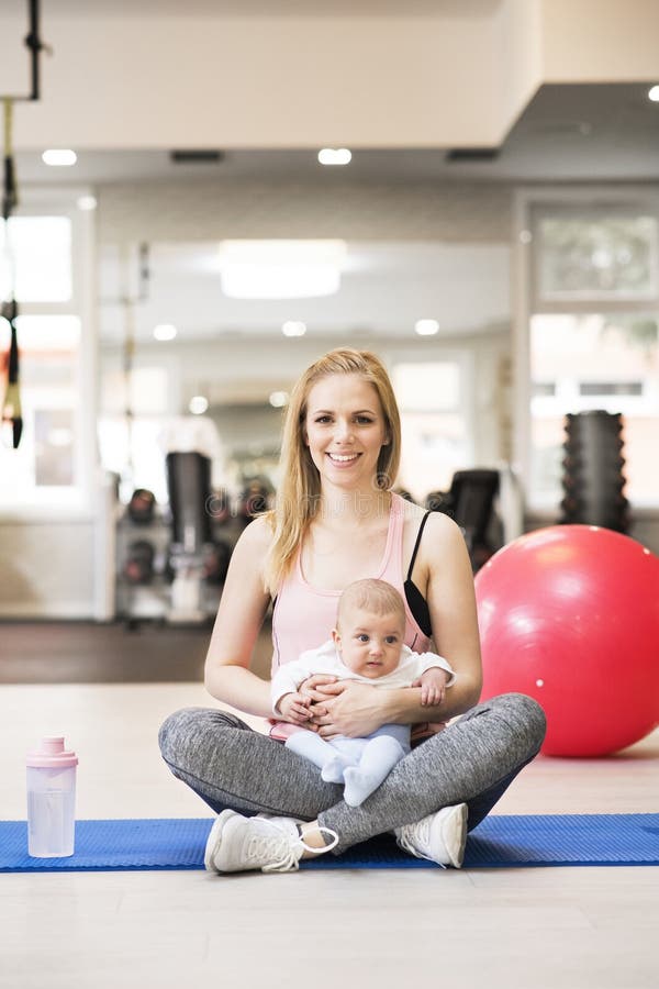Portrait of New Mom on Group Exercise Class in Gym. Moms Staying Active ...