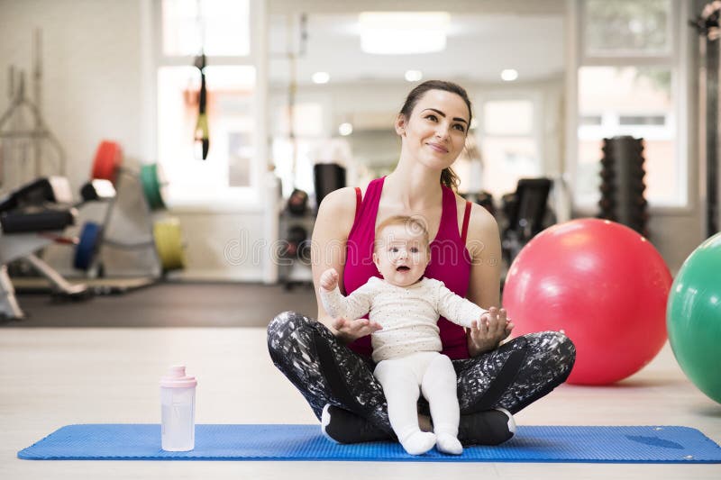 Portrait of New Mom on Group Exercise Class in Gym. Moms Staying Active ...