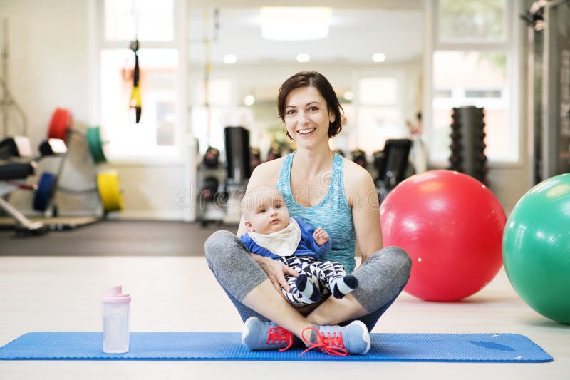 Portrait of New Mom on Group Exercise Class in Gym. Moms Staying Active ...