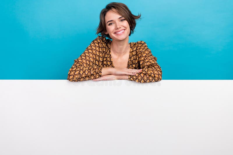 Portrait Of Nice Cheerful Girl Toothy Smile Demonstrate Empty Space Ad
