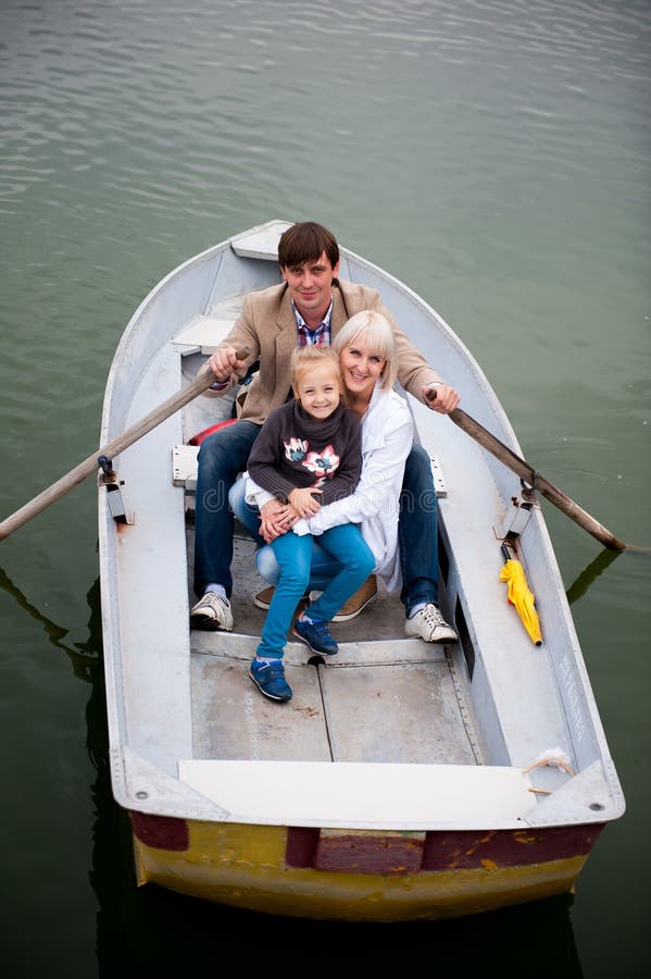 Portrait of a Nice Family on the Boat. Stock Image - Image of colorful ...