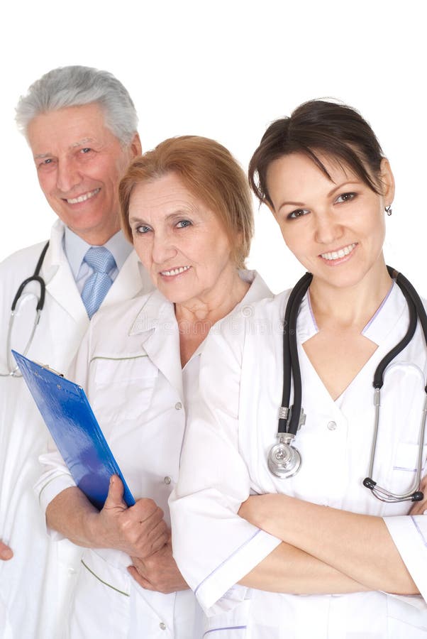 Three Doctors Walking Down a Corridor in Hospital Stock Photo - Image ...
