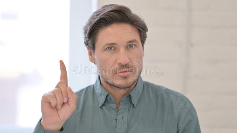 Portrait of No Sign by Middle Aged Man by Finger Gesture Stock Image ...