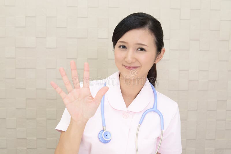 Female Nurse Making Stop Sign Stock Photo - Image of anxiety, japanese ...