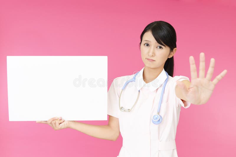 Nurse making stop sign stock image. Image of hand, japan - 131271193