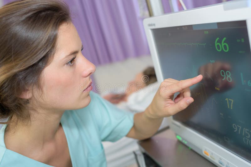 Nurse using a computer stock image. Image of health, station - 29387885