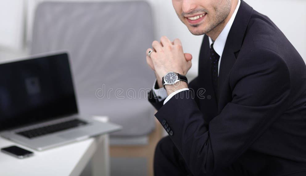 Portrait of Office Worker Man Sitting at Office Desk Using Laptop ...