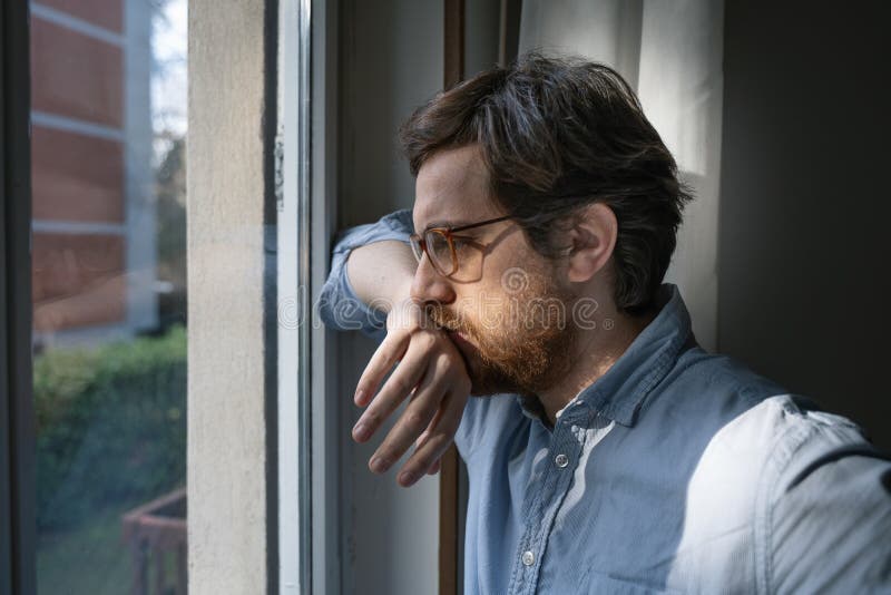 Thoughtful Anxious Guy Looking Out the Window Stock Image - Image of ...