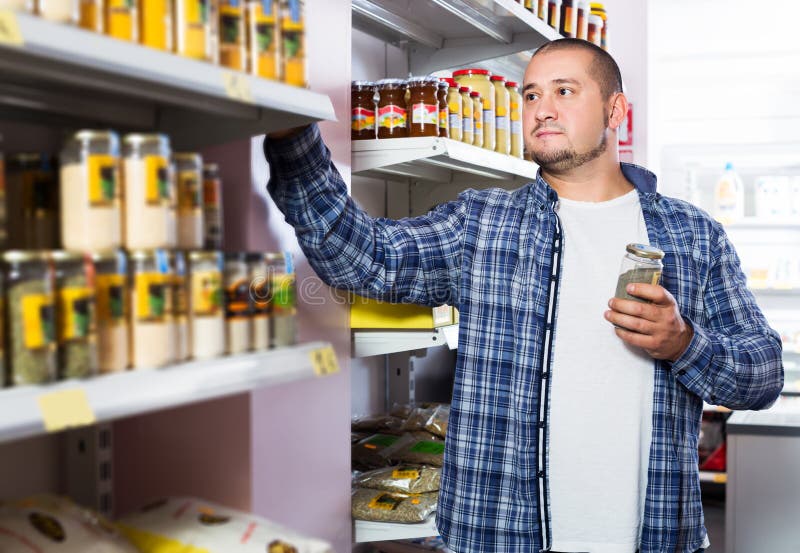 Man Purchasing Peanut Butter Stock Image - Image of holding, provision ...