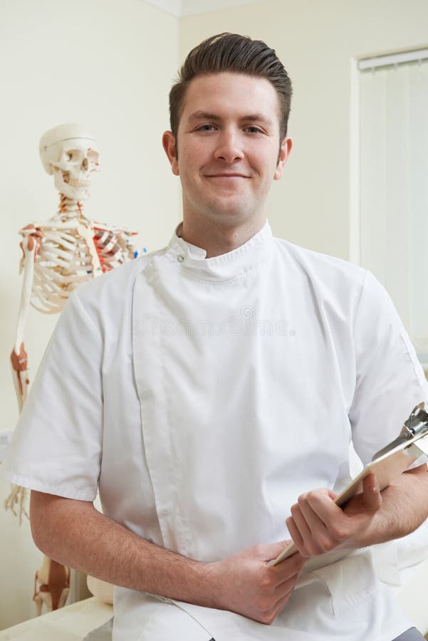 Portrait of Osteopath in Consulting Room Stock Photo - Image of surgery ...