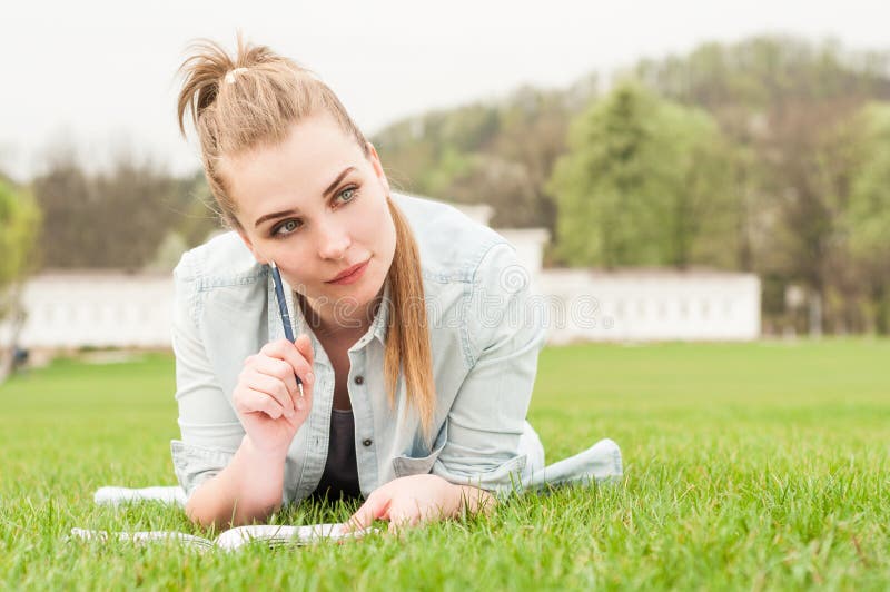 Portrait of Pensive Female Writing Down Notes in Her Journal Stock ...