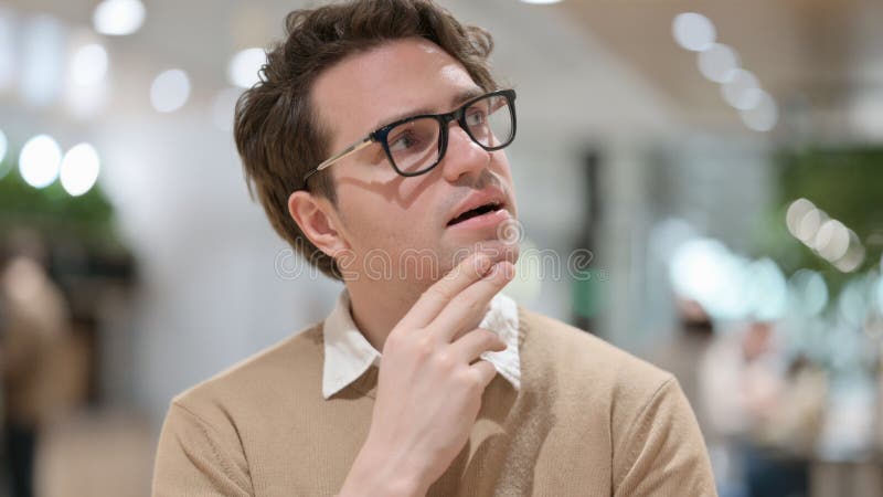 Portrait of Pensive Handsome Young Man Thinking, Getting Idea Stock ...