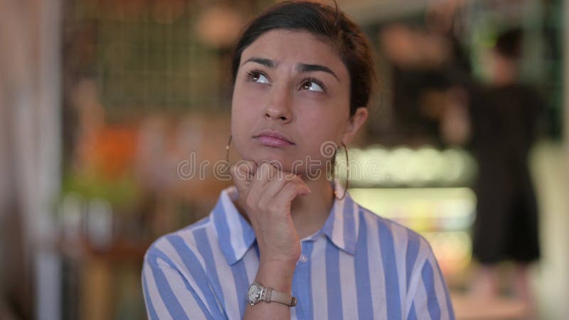 Portrait of Pensive Indian Woman Thinking and Getting Idea Stock Photo ...