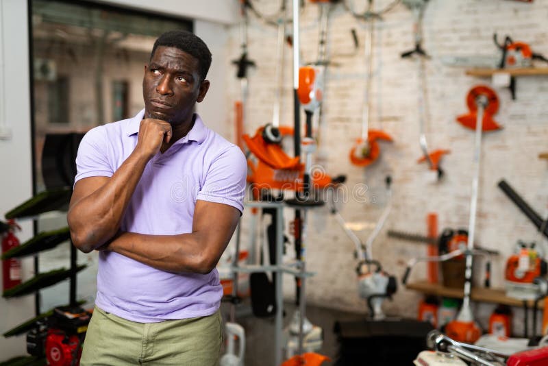 Portrait of Pensive Shopper at Garden Tools Store Stock Image - Image ...