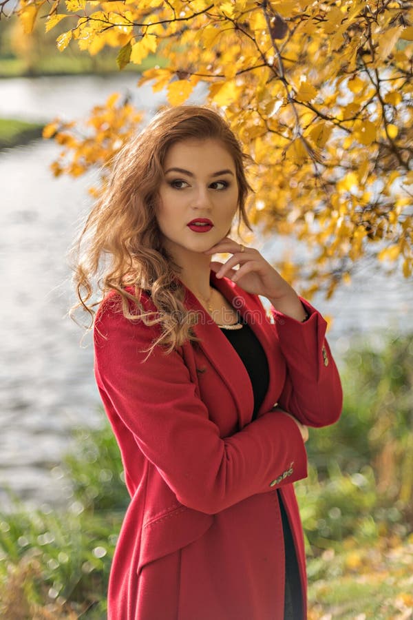 Portrait of a Pensive Young Girl Model in an Autumn Park Stock Image ... Portrait of a Pensive Young Girl Model in an Autumn Park Stock Image ...
