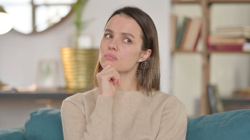 Portrait of Pensive Young Woman Thinking at Home Stock Image - Image of ...