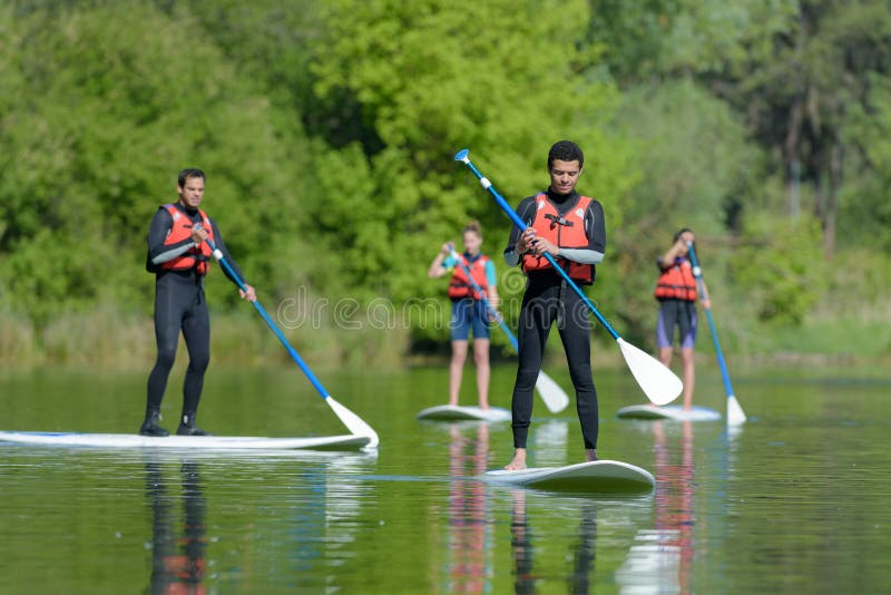Portrait People Doing Standup Paddle Stock Photo - Image of lake, male ...