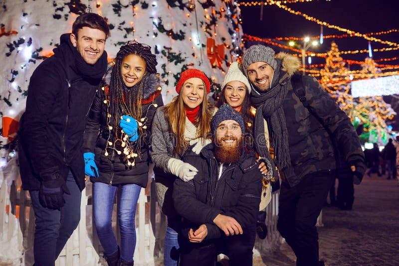 Portrait of People Having Fun at Night in Christmas. Stock Photo ...
