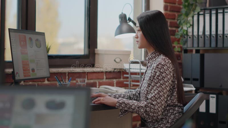 Portrait of Person Designing Data Charts on Computer Stock Video ...