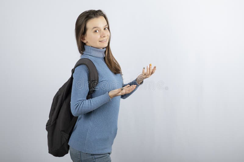 Portrait Photo of a Young Girl Model Standing with Backpack and Posing ...