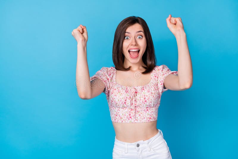 Portrait Photo Of Young Pretty Girlish Woman Wear Cropped Shirt Fists