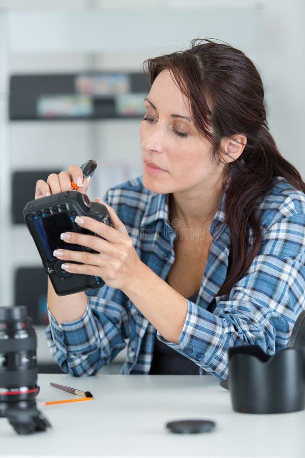 Portrait Photographer Cleaning Photo Camera Stock Photo - Image of ...