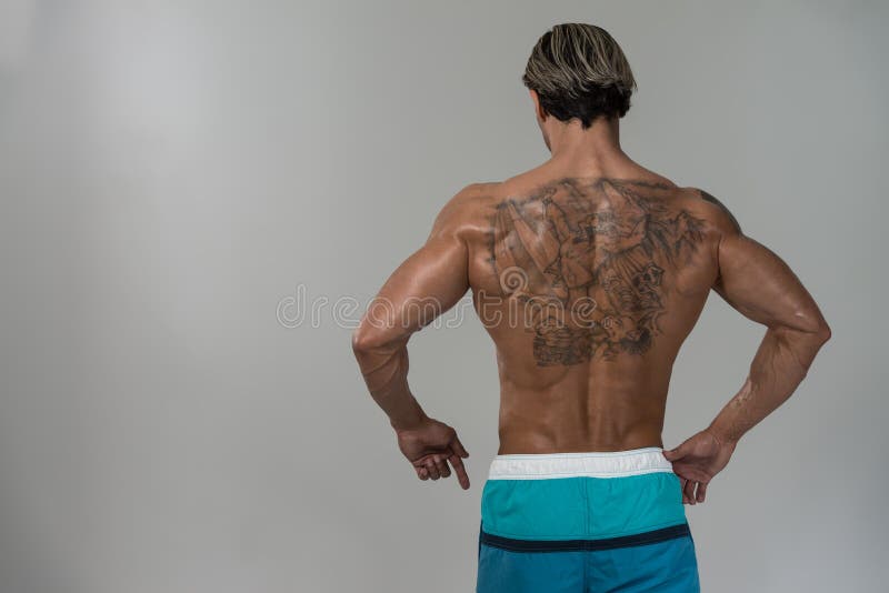 Portrait of a Physically Fit Man Back Poses Stock Image - Image of gray ...