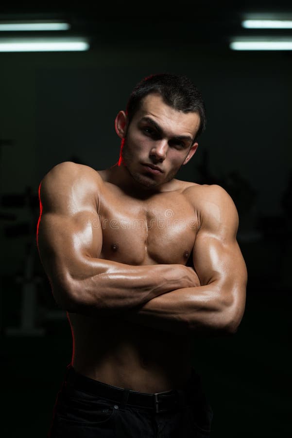Portrait of a Physically Fit Young Man Stock Photo - Image of dark ...