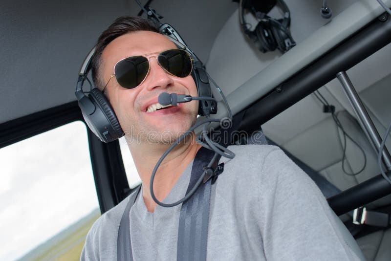 Portrait pilot in aircraft stock image. Image of flight - 83395205