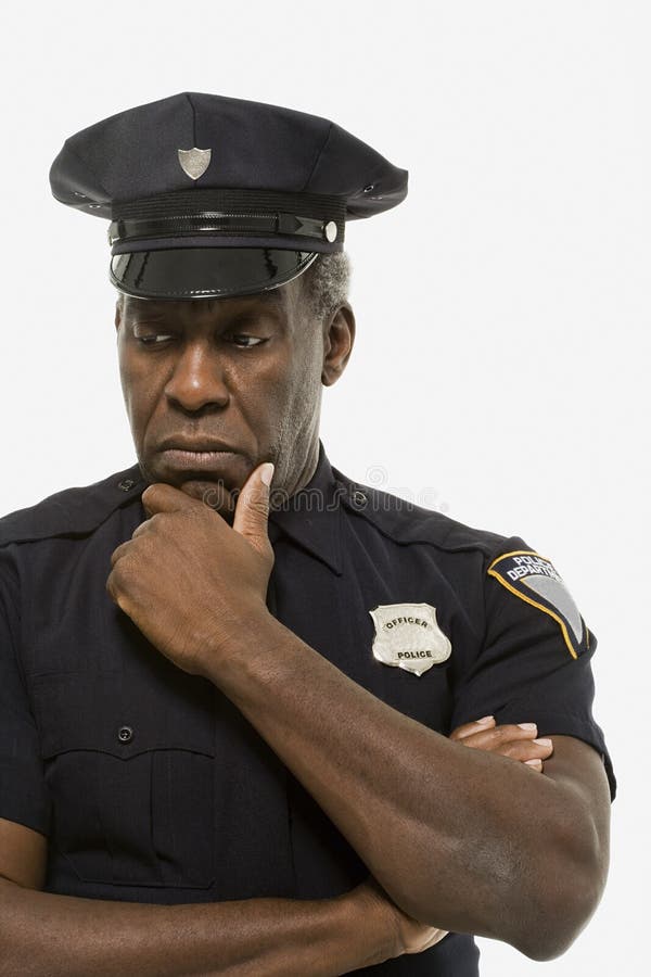 Serious Police Officer Saluting, Studio Shot, Full Length Stock Image ...