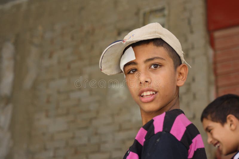 Portrait of a Poor Boy in the Street in Giza, Egypt Editorial Stock ...