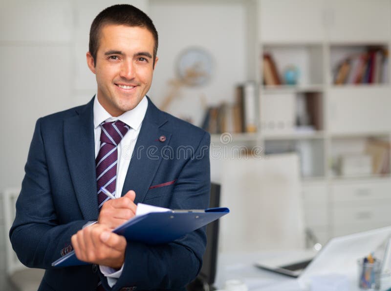 Portrait of Positive Business Man with Folder of Documents Stock Image ...