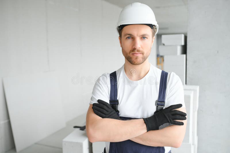 Portrait of Positive, Handsome Young Male Builder in Hard Hat. Stock ...