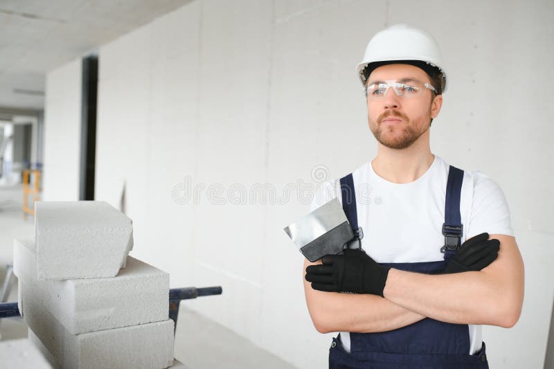 Portrait of Positive, Handsome Young Male Builder in Hard Hat. Stock ...