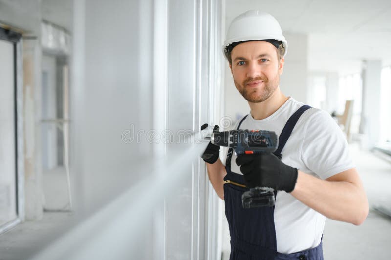 Portrait of Positive, Handsome Young Male Builder in Hard Hat. Stock ...
