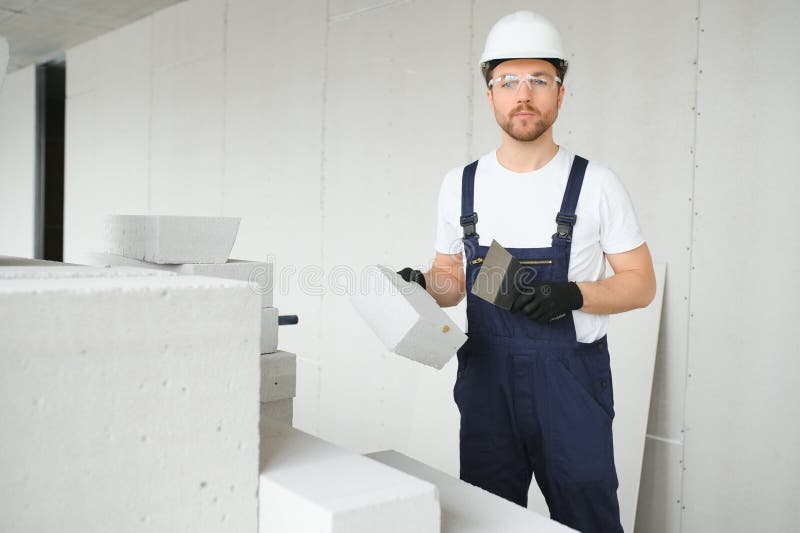 Portrait of Positive, Handsome Young Male Builder in Hard Hat. Stock ...