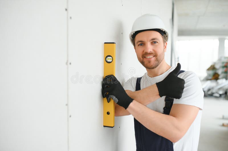 Portrait of Positive, Handsome Young Male Builder in Hard Hat. Stock ...