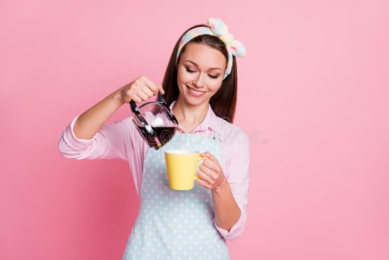Portrait Of Positive House Wife Hold Coffee Pot Pour Espresso Cup Wear