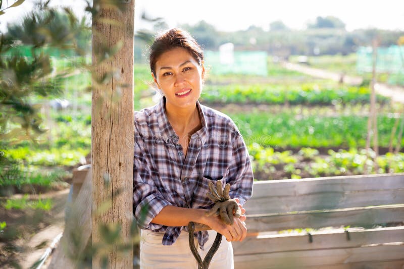 Portrait of Positive Woman in the Backyard of Farm Stock Image - Image ...