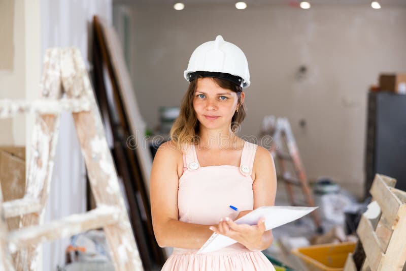 Portrait of Positive Woman Construction Manager with Documents Stock ...