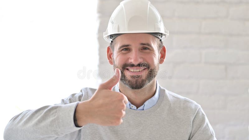 Portrait of Positive Young Engineer Doing Thumbs Up Stock Image - Image ...