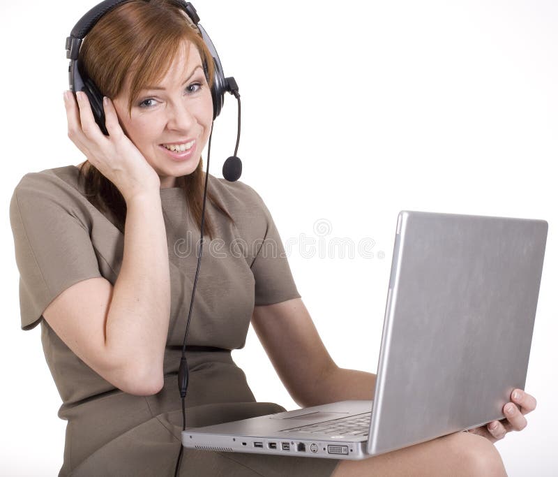 Portrait of Pretty Call Operator Smiling and Typing on Lap Top Stock ...