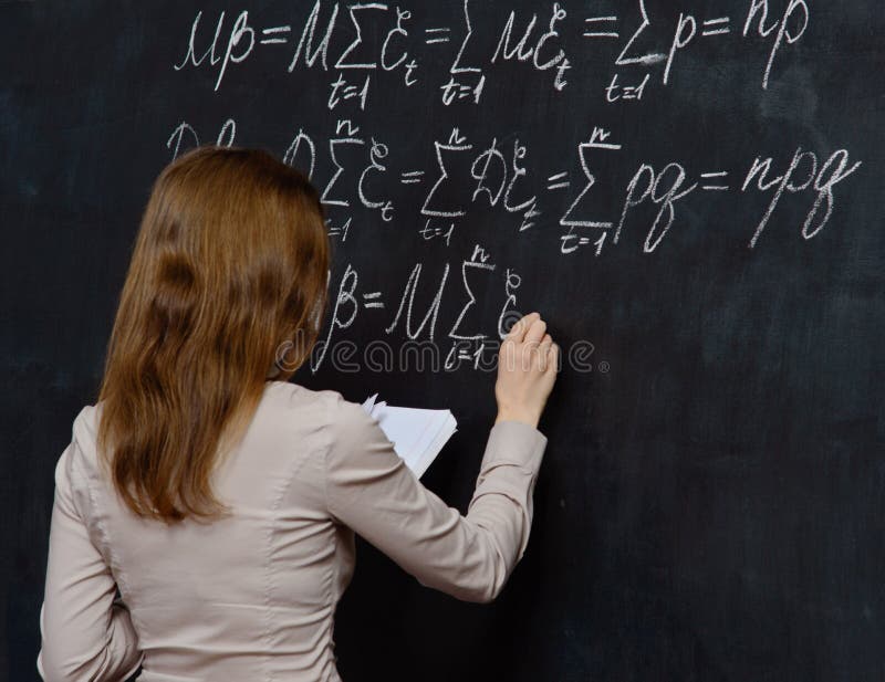 Portrait of a Pretty Student Doing Maths on a Blackboard Stock Photo ...