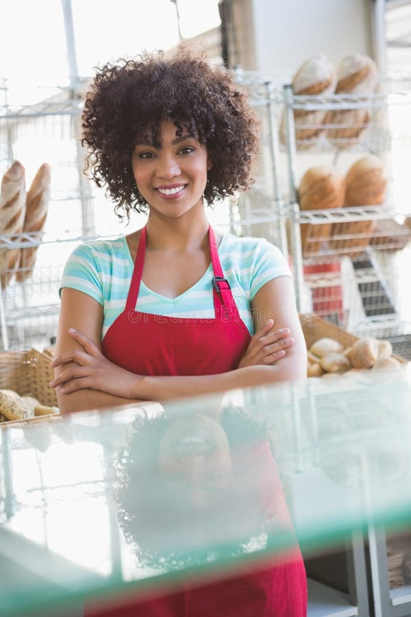 Portrait of Pretty Waitress with Arms Crossed Stock Photo - Image of ...